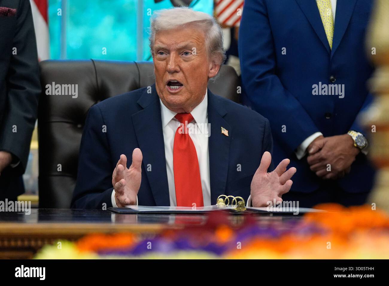 President Donald Trump answers questions from reporters during a Diwali ...