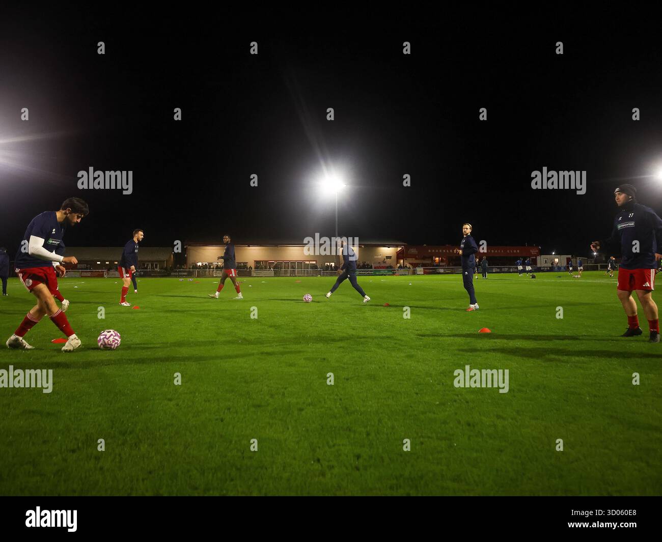 BRACKLEY, ENGLAND - OCTOBER 21: Brackley Town warms up before the ...