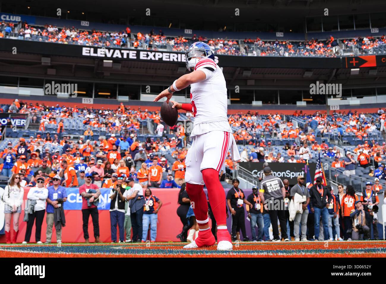 New York Giants quarterback Jaxson Dart (6) warms up against the Denver ...
