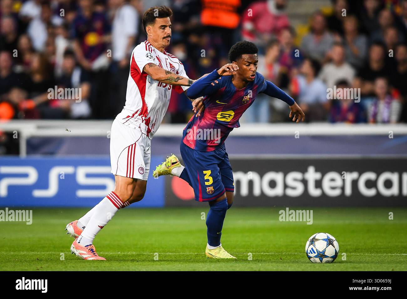 Dani GARCIA of Olympiacos and Alejandro BALDE of Barcelona during the ...