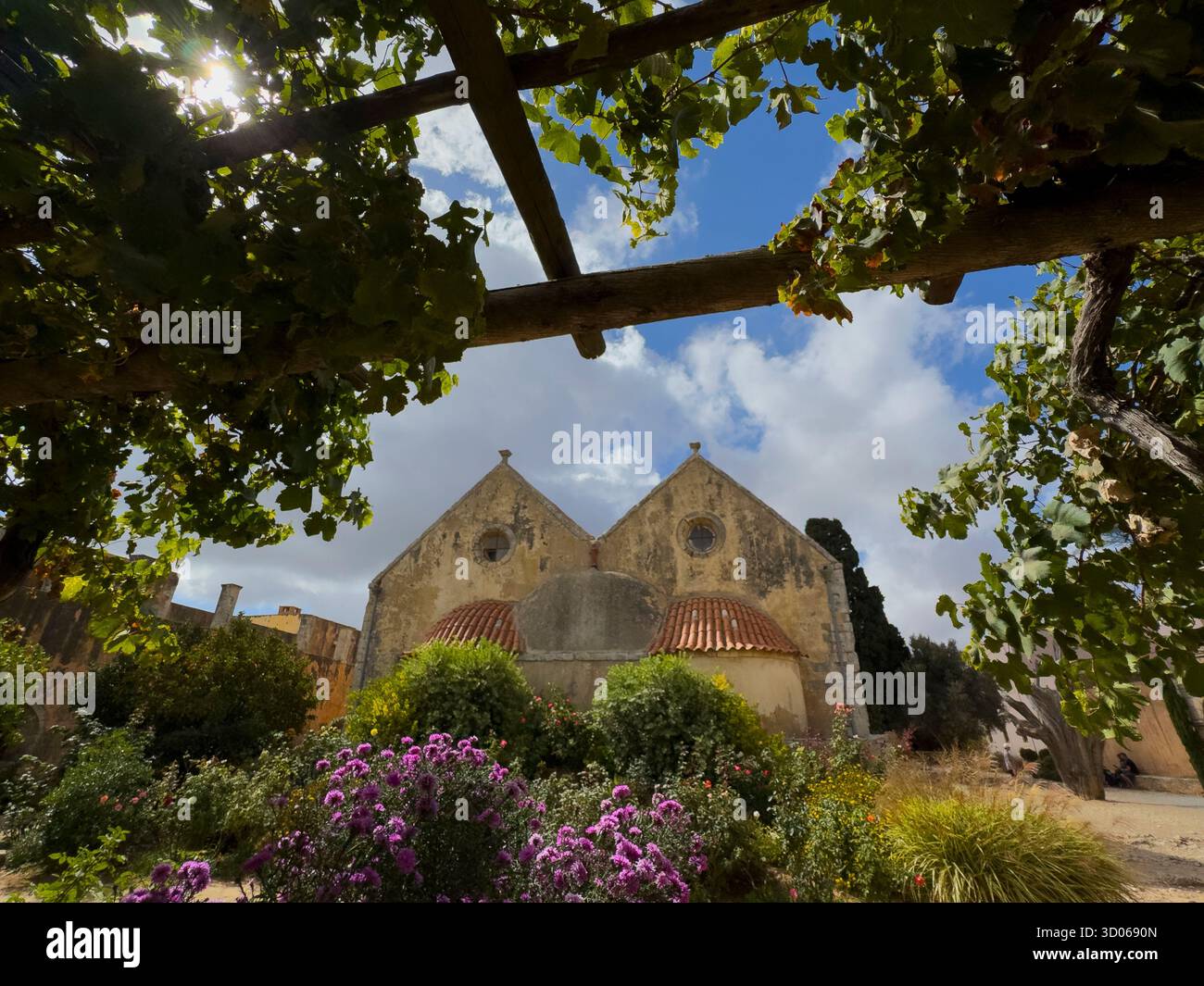 Garden courtyard of the 16th century Greek Orthodox Arkadi Monastery ...