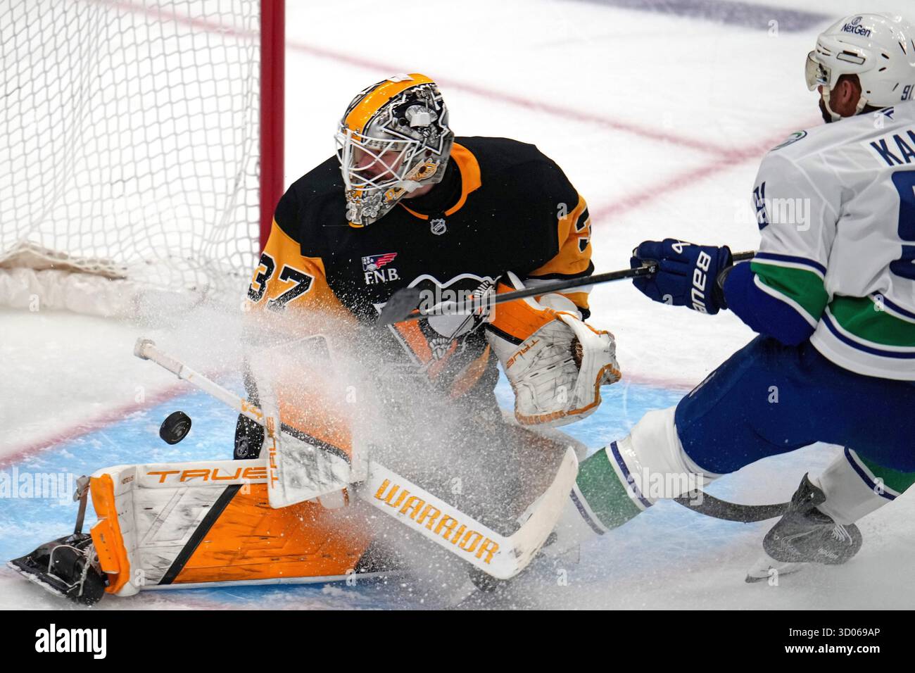 Pittsburgh Penguins goaltender Arturs Silovs (37) stops a shot by ...