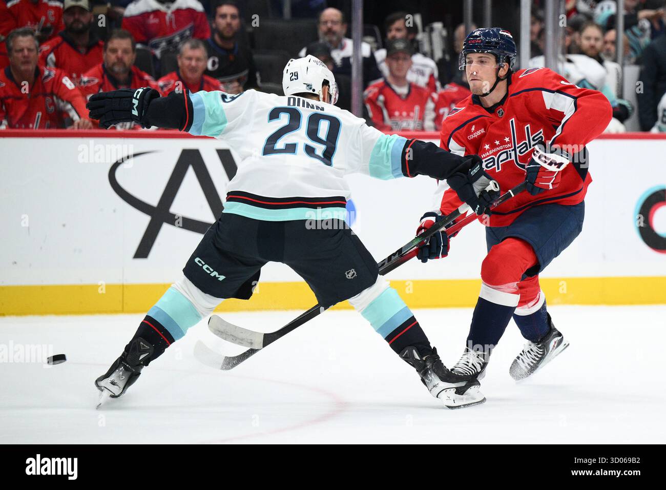 Washington Capitals right wing Ryan Leonard, right, takes a shot ...