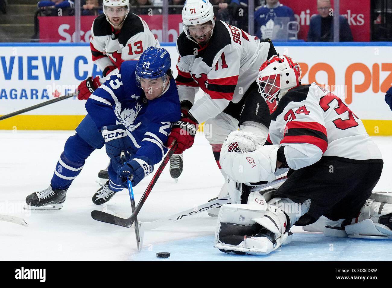 New Jersey Devils defenceman Jonas Siegenthaler (71) and Toronto Maple ...