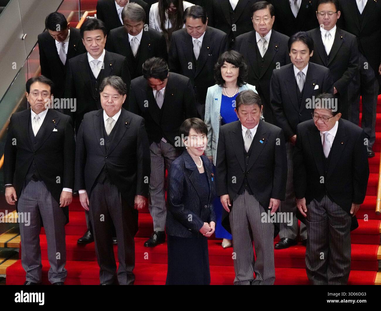 Japan's Prime Minister Sanae Takaichi, front center, smiles after a ...