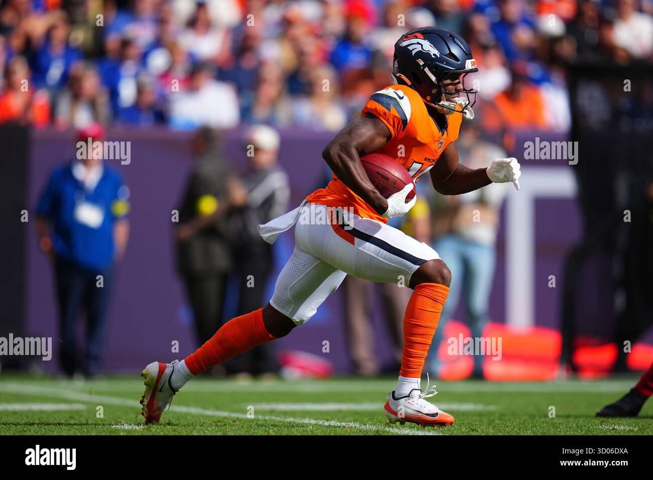 Denver Broncos wide receiver Marvin Mims Jr. runs a punt return against ...