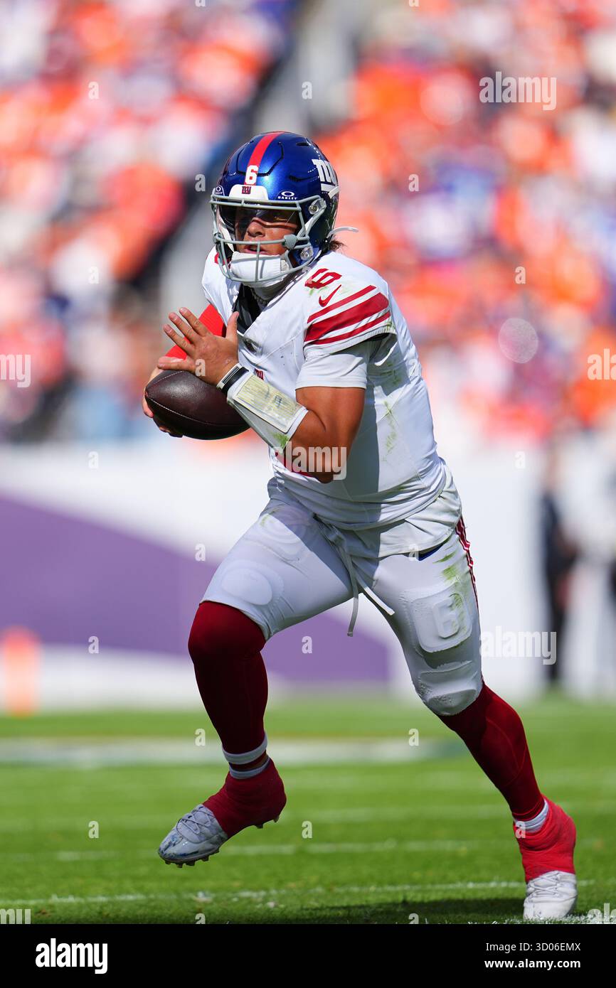 New York Giants quarterback Jaxson Dart scrambles against the Denver ...