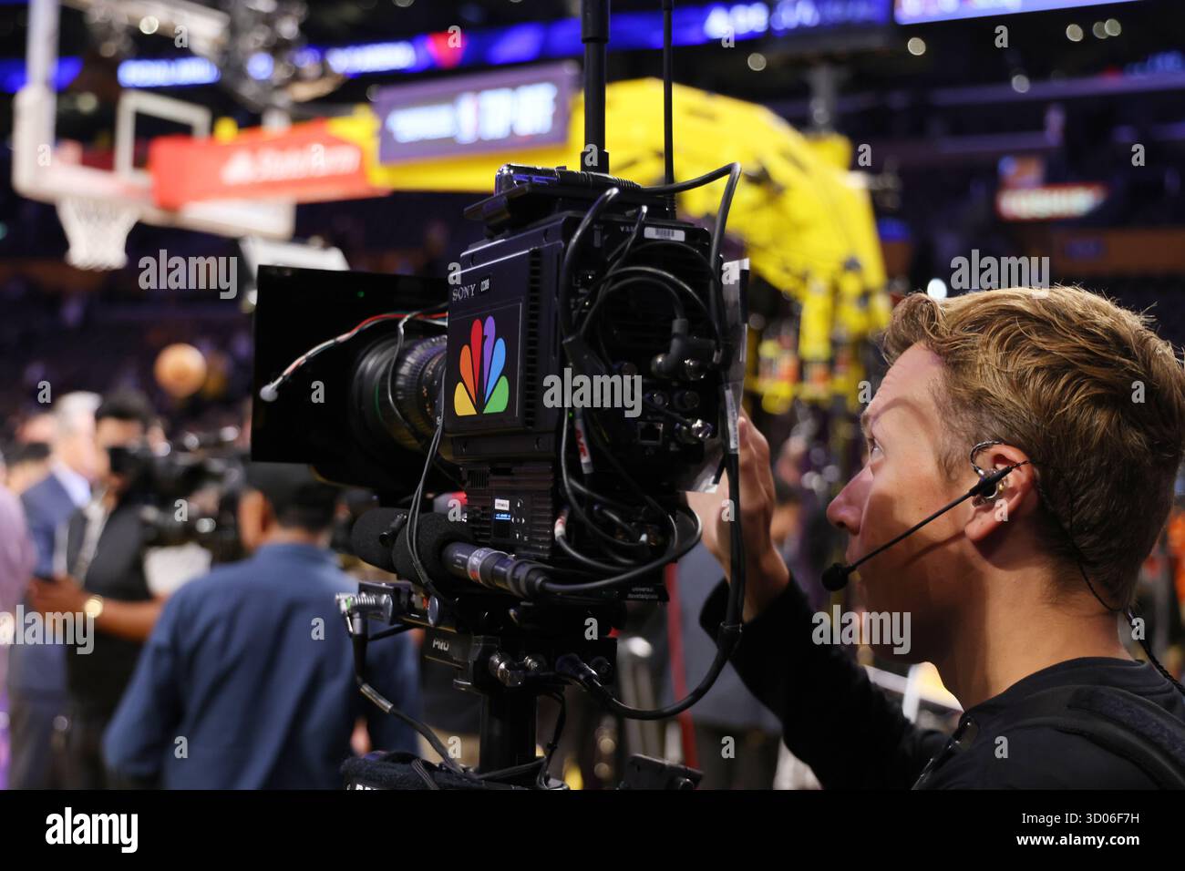 An NBC cameraman films warmups before an NBA basketball game between ...