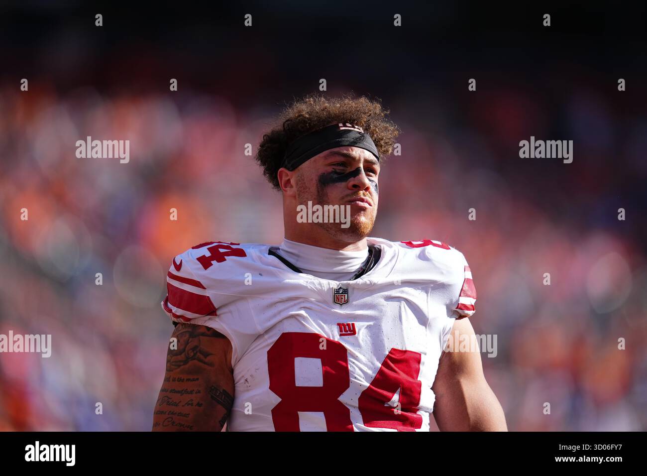 New York Giants tight end Theo Johnson looks on against the Denver ...