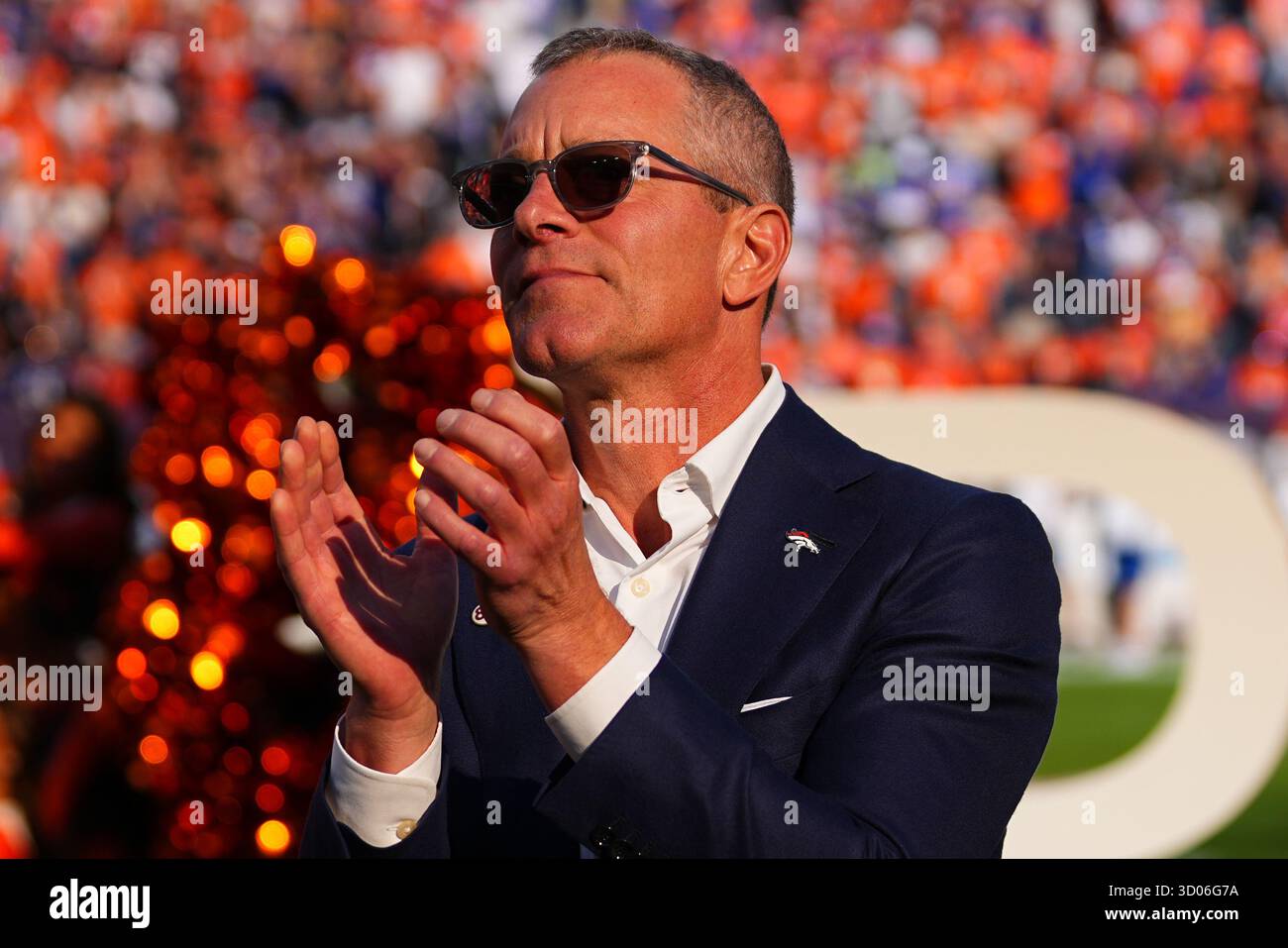 Denver Broncos owner and CEO Greg Penner looks on against the New York ...