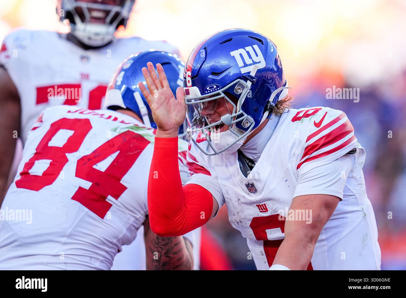 New York Giants tight end Theo Johnson celebrates a touchdown against ...