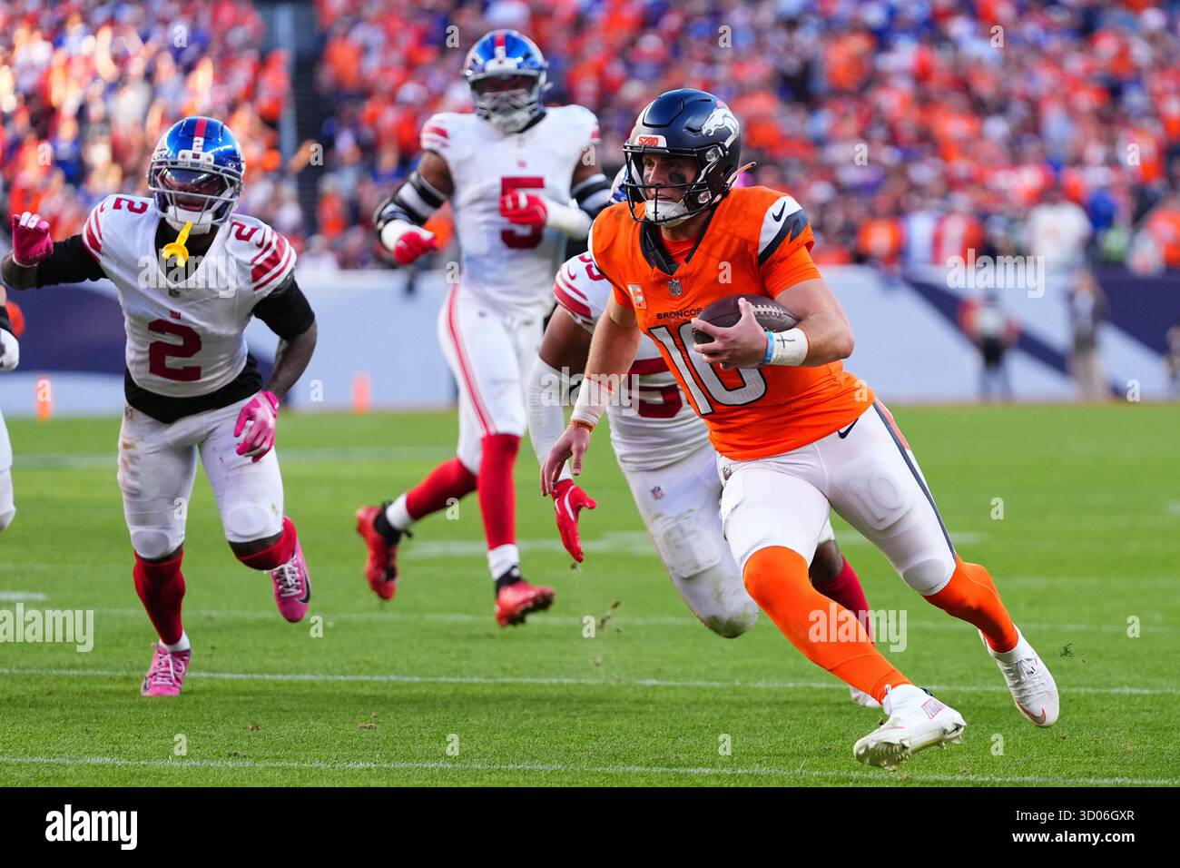 Denver Broncos quarterback Bo Nix (10) runs for a touchdown against the ...