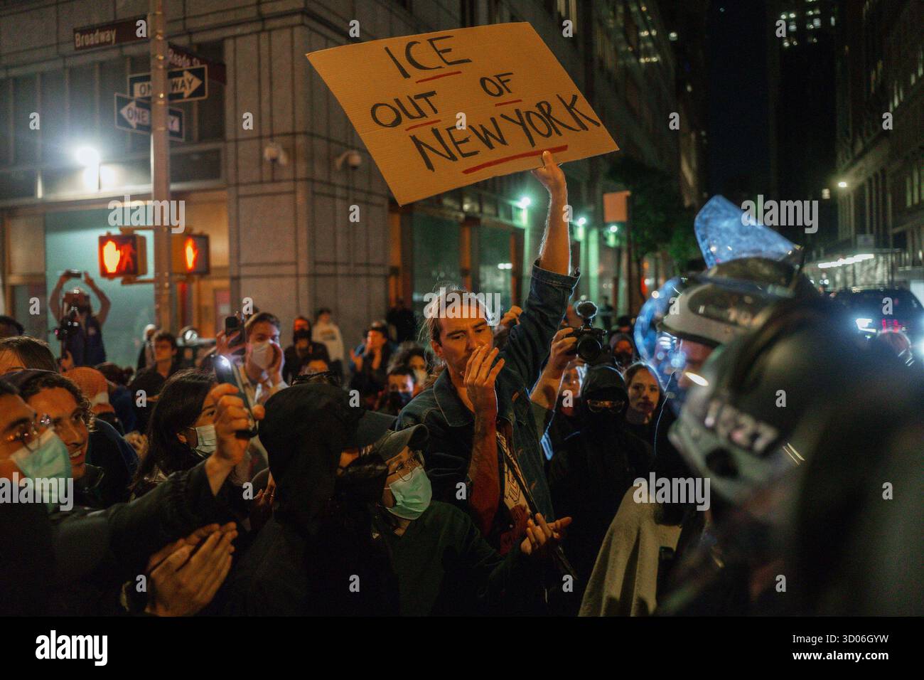 Protesters shout slogans during a protest against immigration crackdown ...