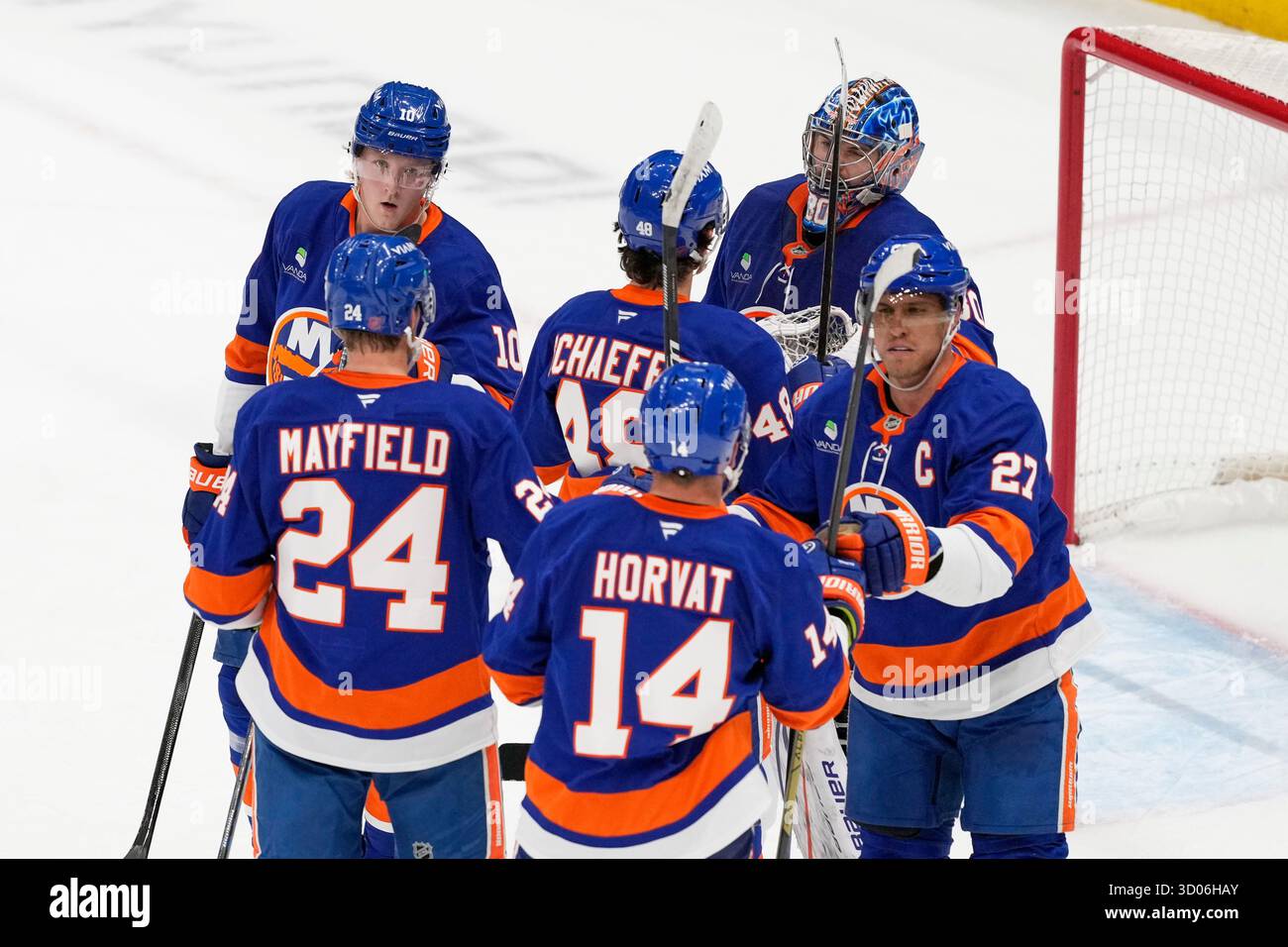 New York Islanders goaltender Ilya Sorokin celebrates with teammates ...