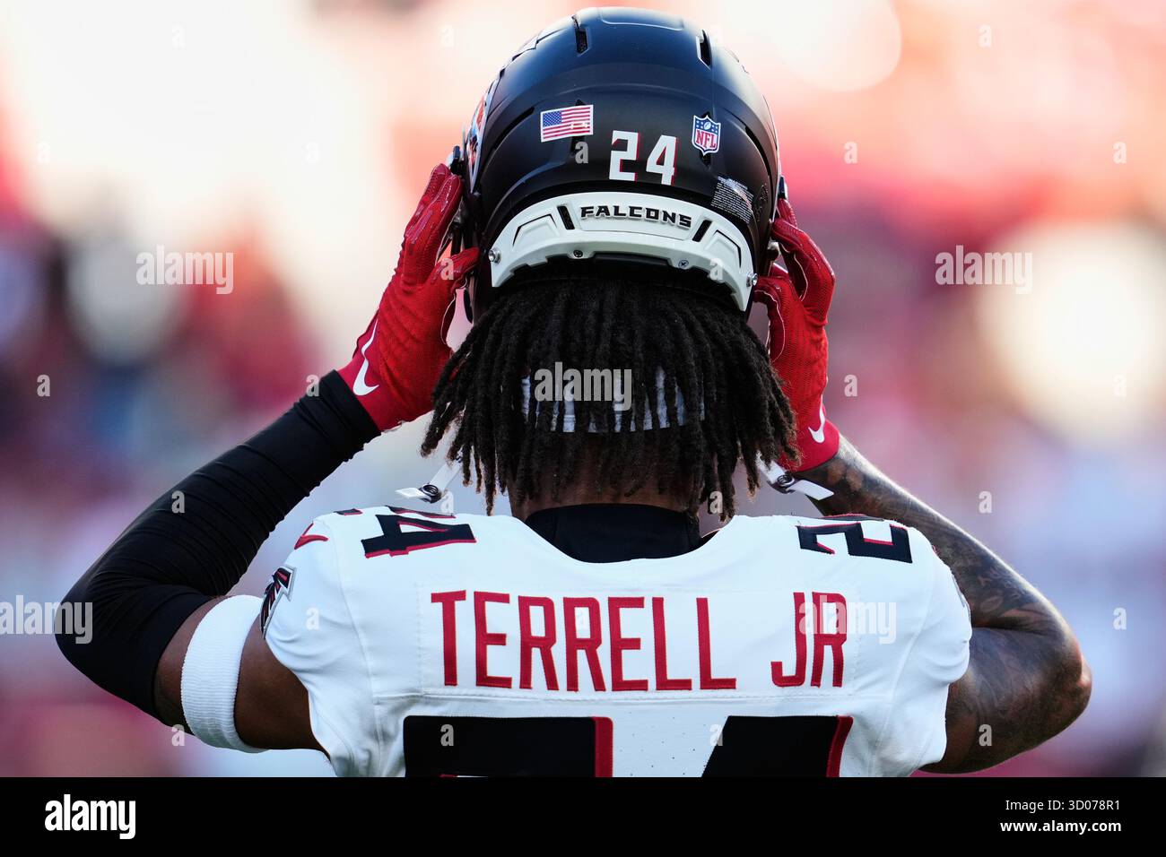 Atlanta Falcons cornerback A.J. Terrell Jr. puts on his helmet before ...