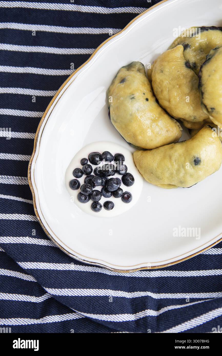 Sweet fruit dumplings with fresh forest blueberries. Homemade fresh ...