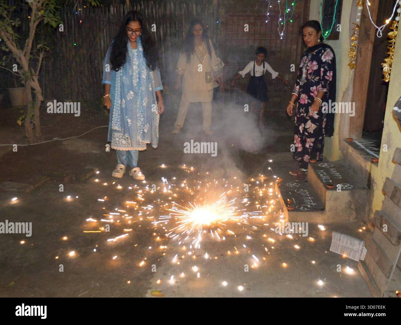 PATNA, INDIA - OCTOBER 20: Girls firing crackers on the occasion of ...