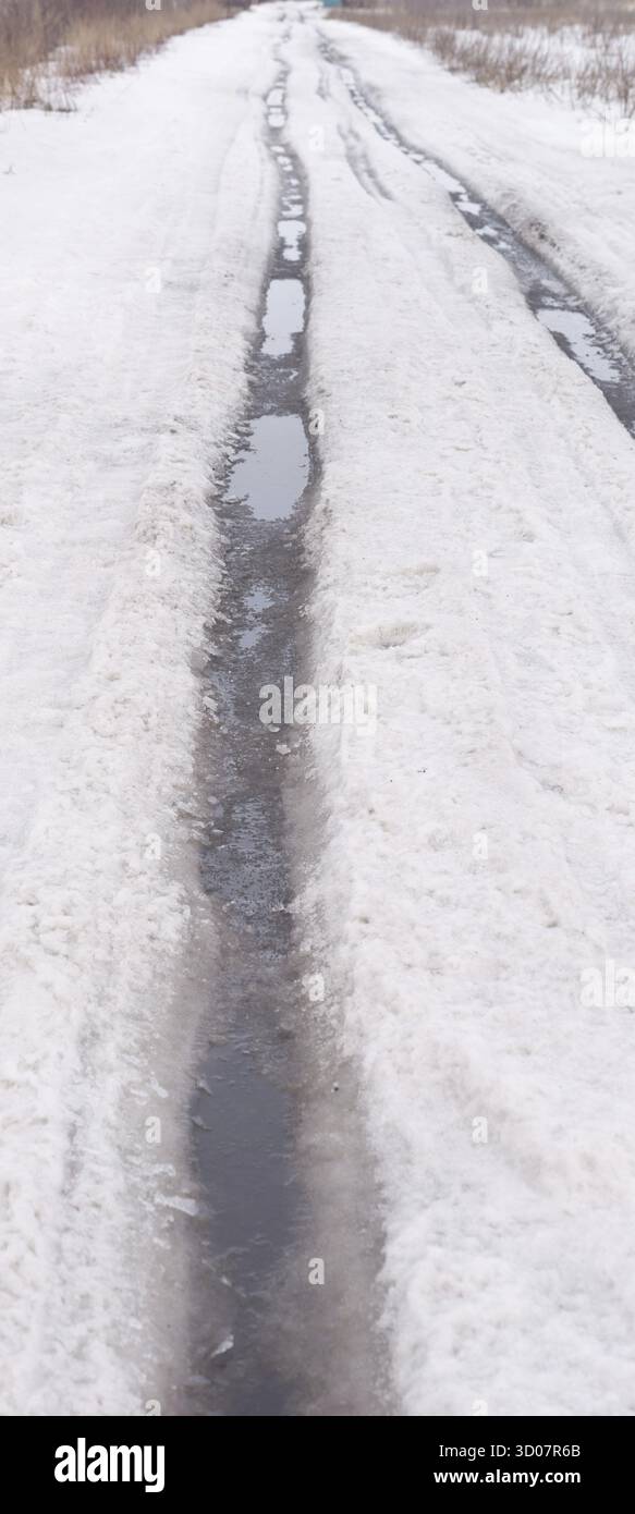 Spring road snow water hi-res stock photography and images - Alamy