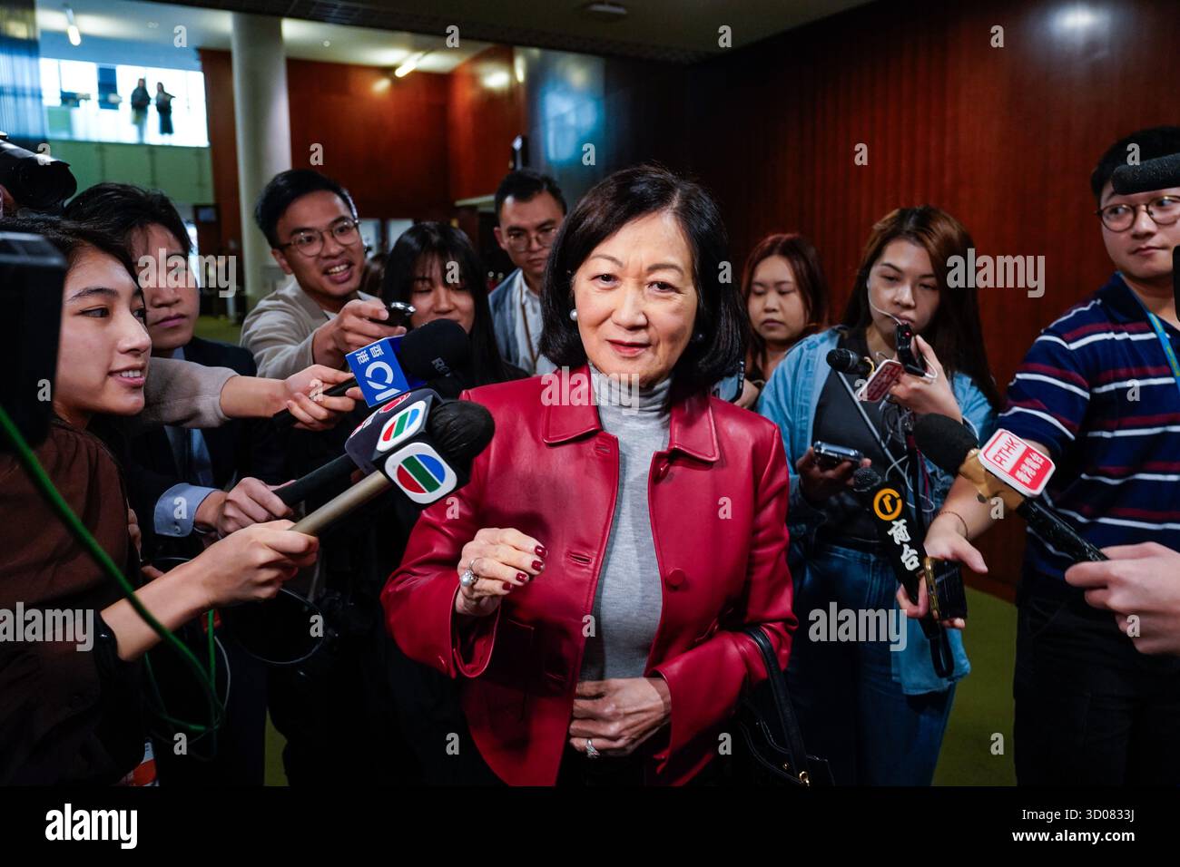 Media reporters surround Hong Kong lawmakers Regina Ip Lau Suk-yee ...