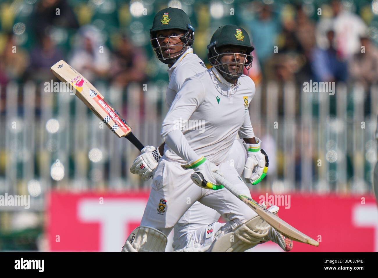 South Africa's Senuran Muthusamy, right, and Kagiso Rabada run between ...