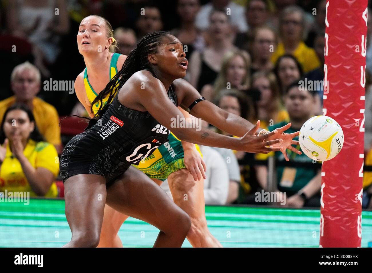 New Zealand's Grace Nweke reaches for the ball as Australia's Courtney ...
