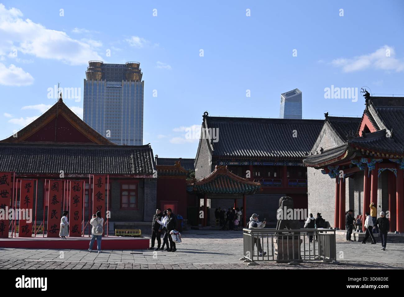 Tourists visit the Mukden Palace in Shenyang City, northeast China's ...