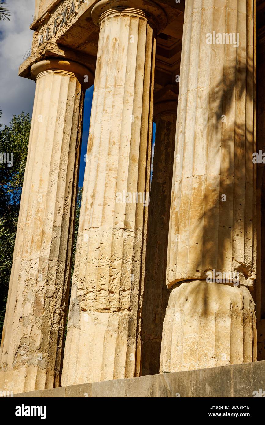 Close-up of weathered limestone columns showing cracks and surface ...