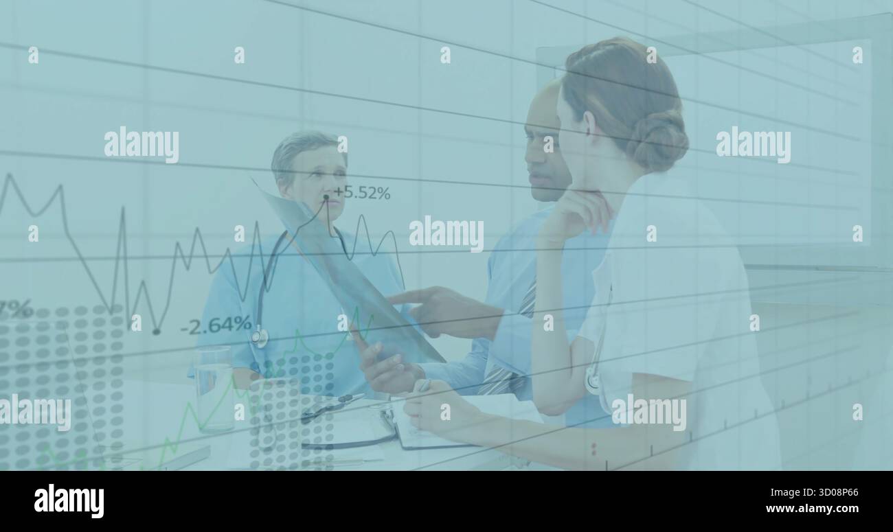 Reviewing three doctors analyzing line graph at hospital meeting room ...
