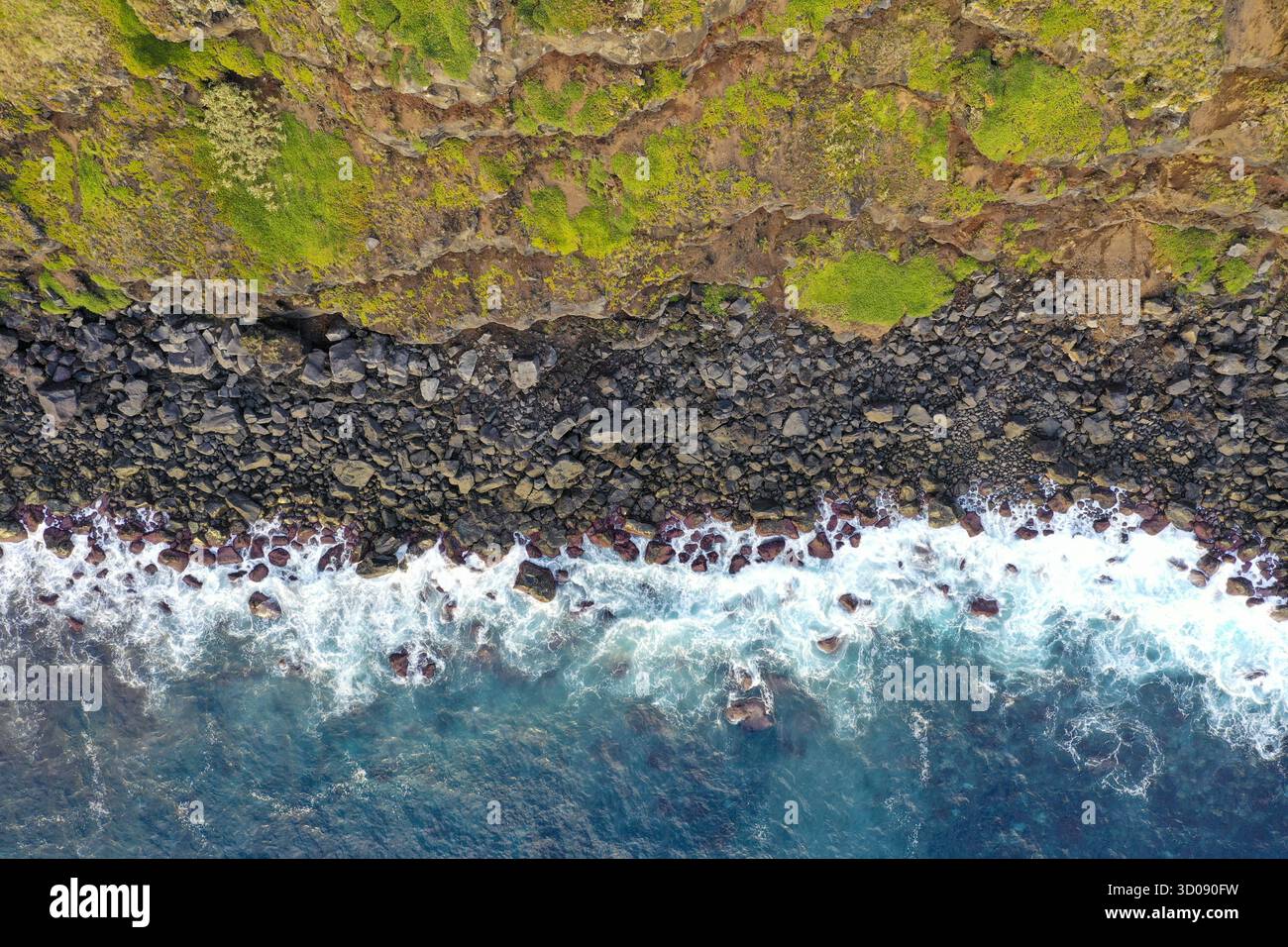 Aerial view of the rugged coastline where the cliffs meet the ...