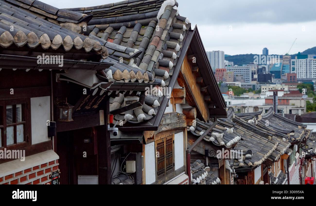Traditional Korean architecture against modern high rise buildings in ...
