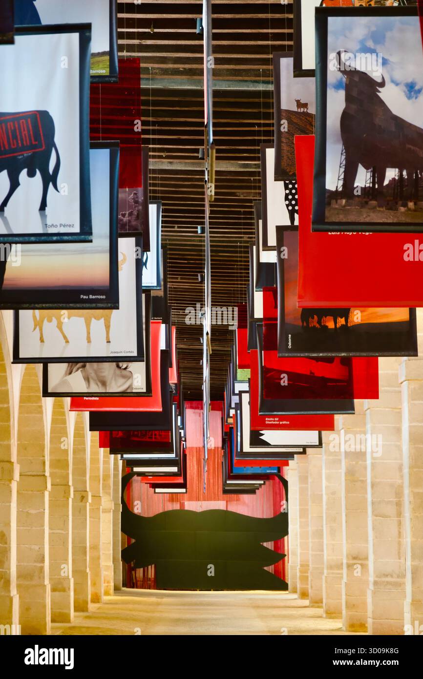 Inside the Toro Gallery exhibition hall with art objects and suspended ...