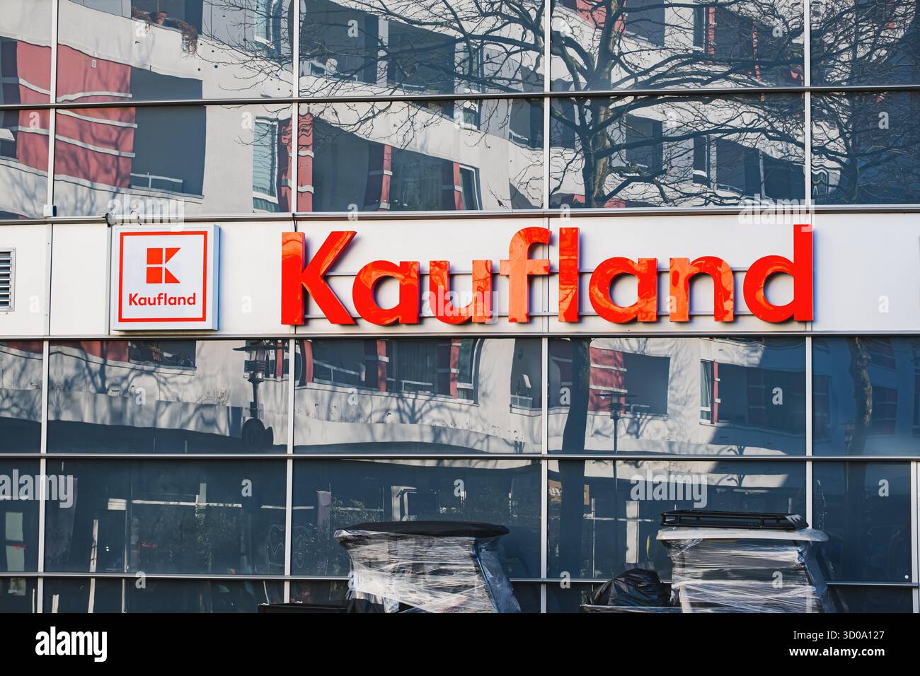 Logo of Kaufland, German hypermarket chain above the entrance to the ...