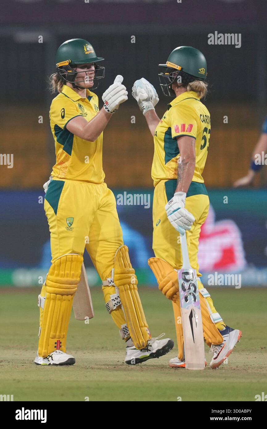 Australia's Ashleigh Gardner ,left, gives fist touch to Australia's ...