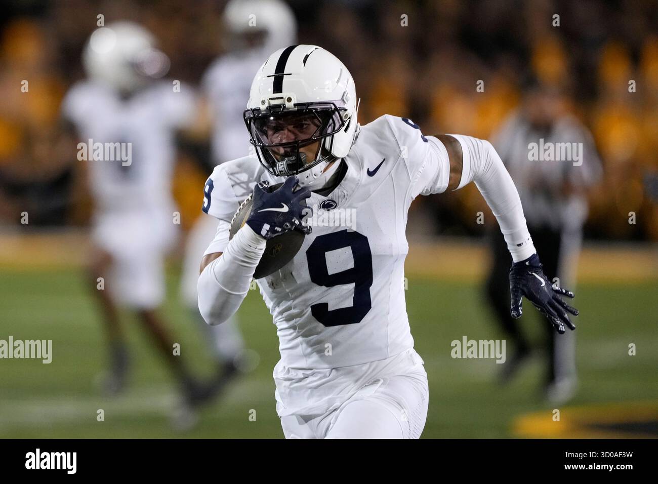 Penn State cornerback Elliot Washington II (9) returns a blocked punt ...