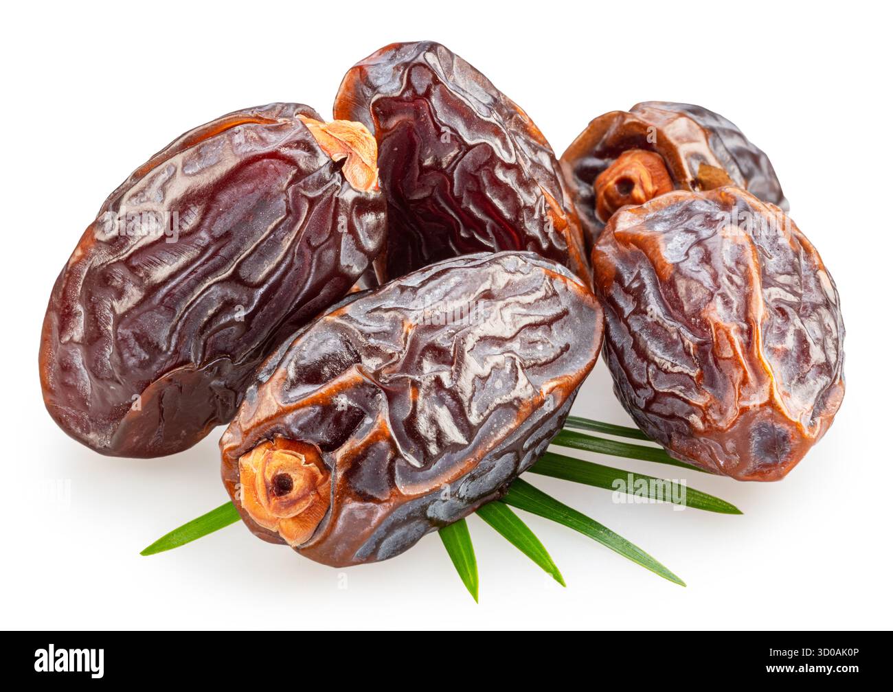 Semi-dried dates or date palm fruits lie on palm leaves isolated on ...