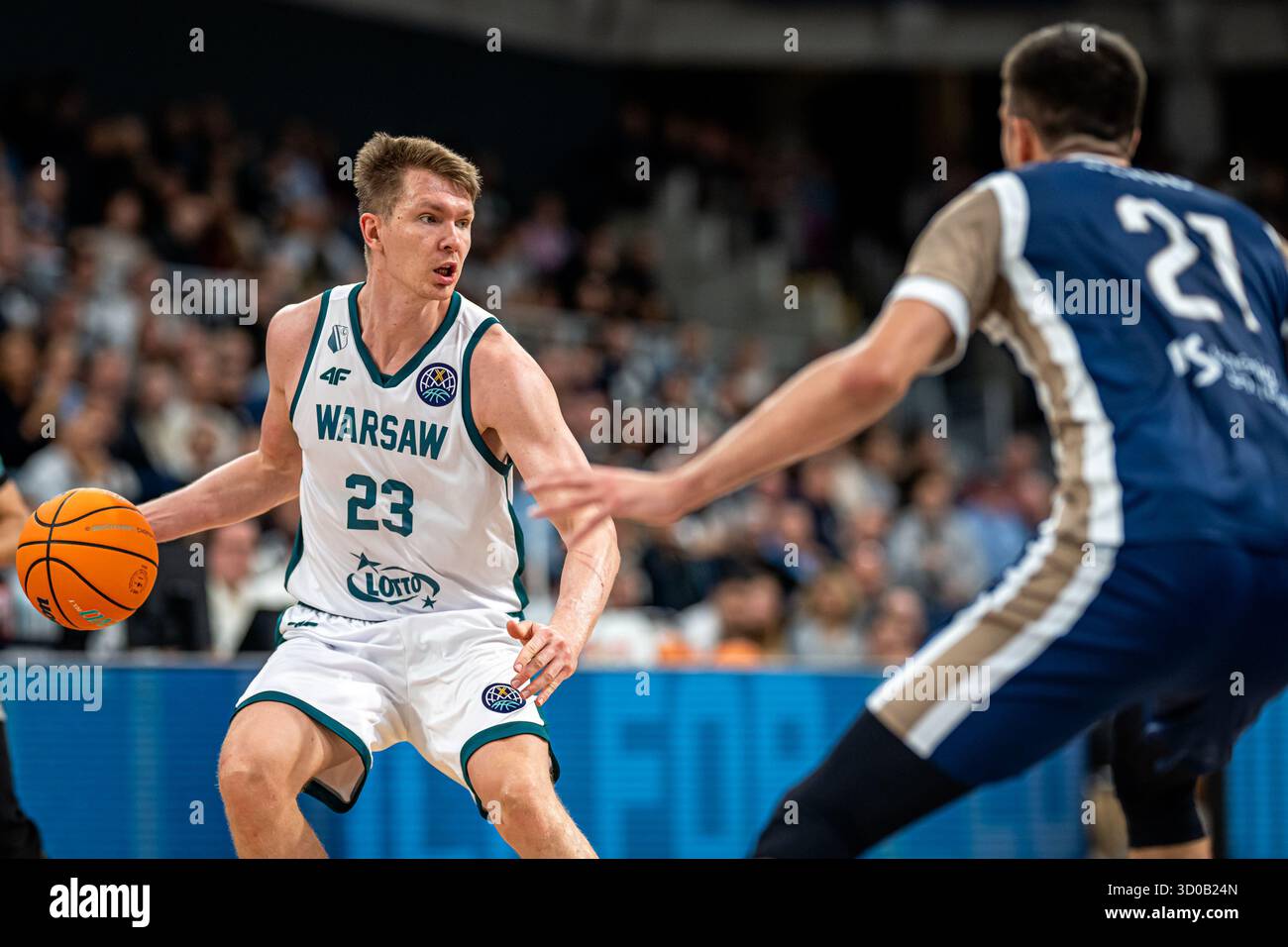 Michal Kolenda (23; Legia Warszawa) dribbles the ball Basketball ...
