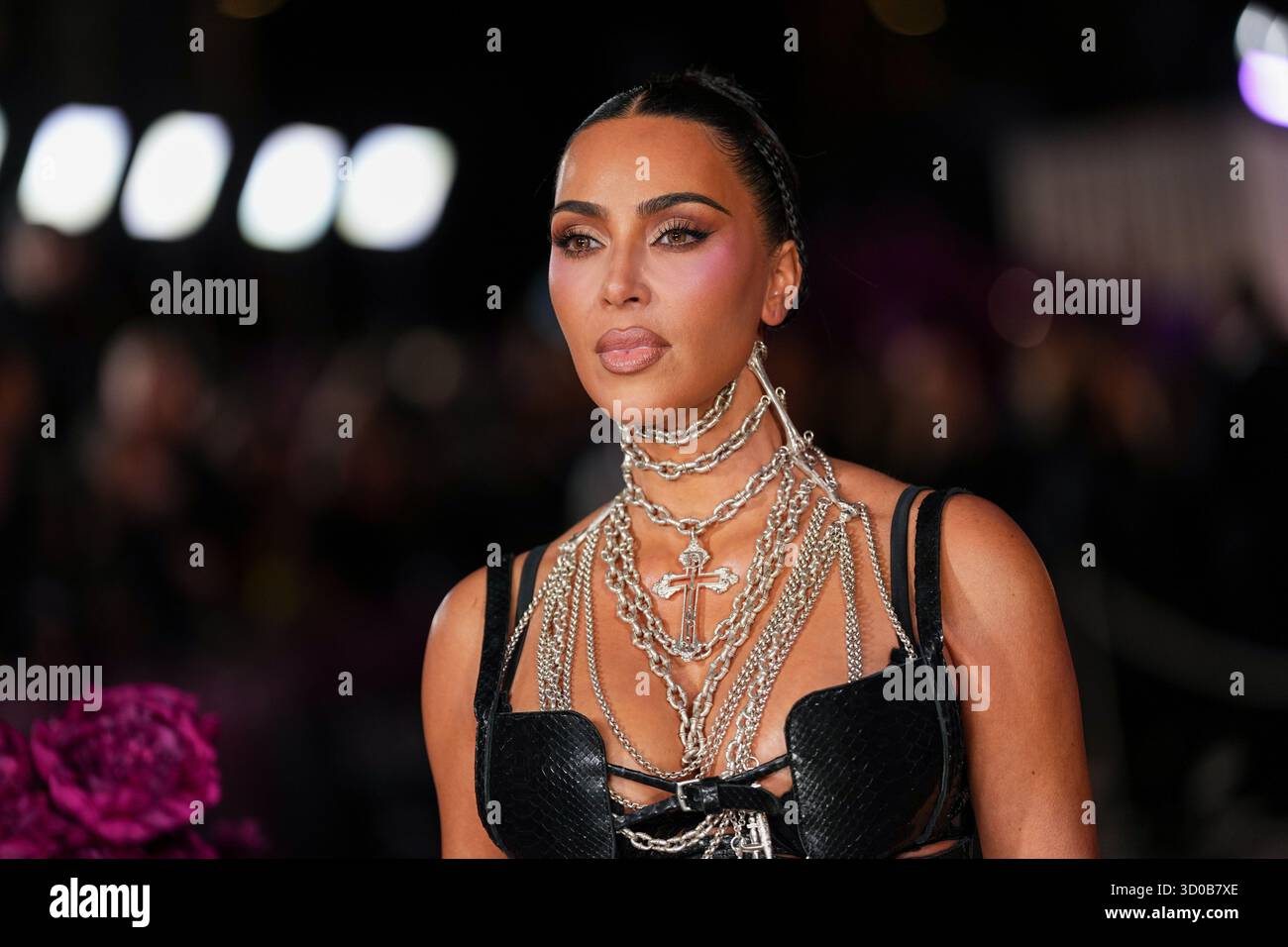 Kim Kardashian poses for photographers upon arrival at the premiere of ...