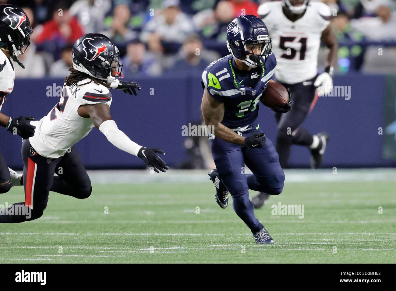 Seattle Seahawks wide receiver Jaxon Smith-Njigba (11) carries the ball ...