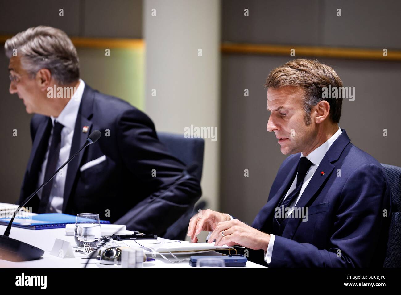 French President Emmanuel Macron, right, and Croatia's Prime Minister ...