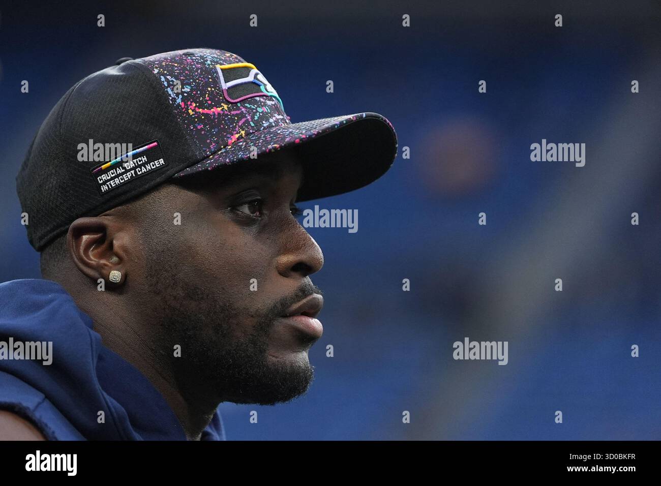Seattle Seahawks linebacker Derick Hall wears a Crucial Catch hat ...