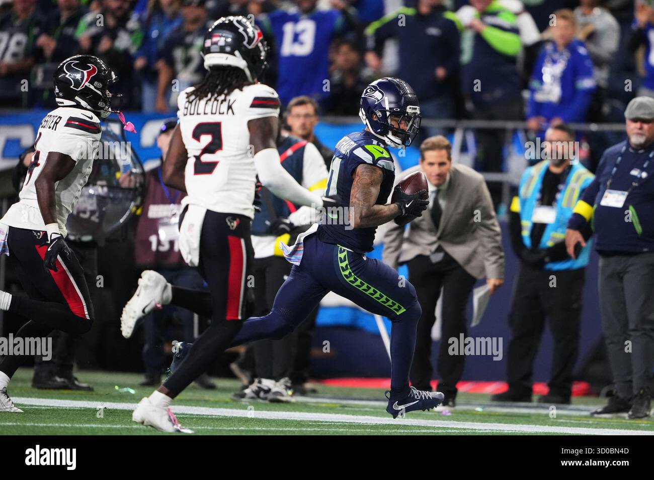 Seattle Seahawks wide receiver Jaxon Smith-Njigba runs the ball against ...