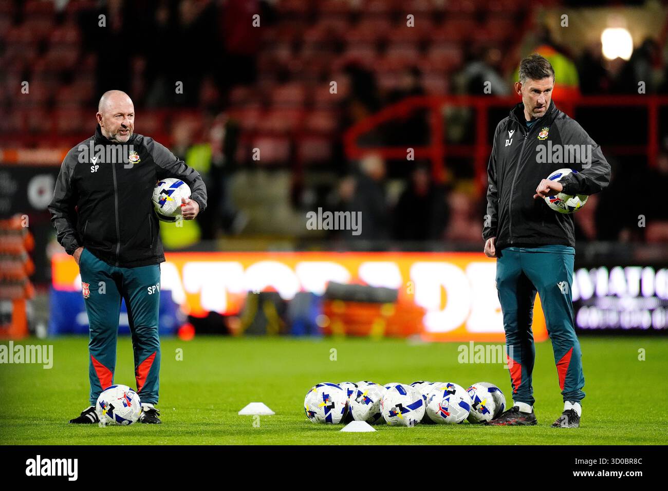 Wrexham assistant manager Steve Parkin (left) and coach David Jones ...