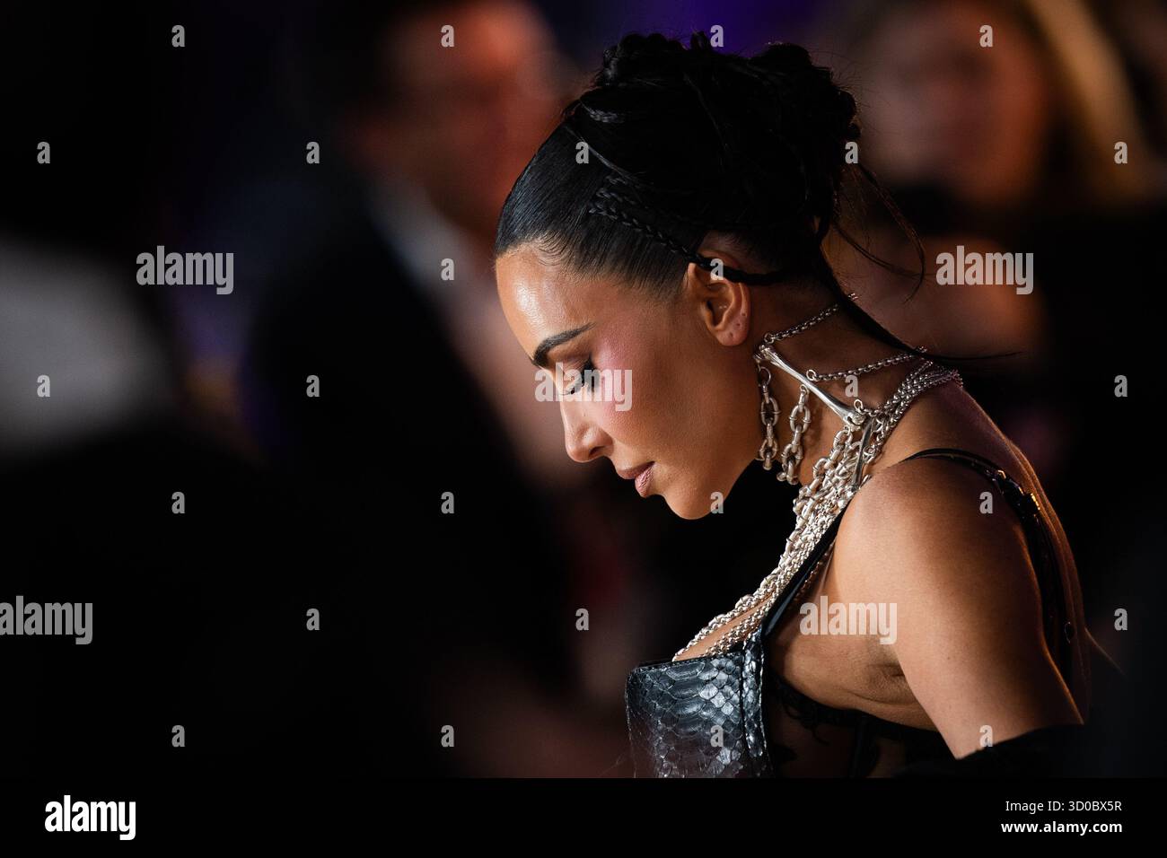 Kim Kardashian poses for photographers upon arrival at the premiere of ...