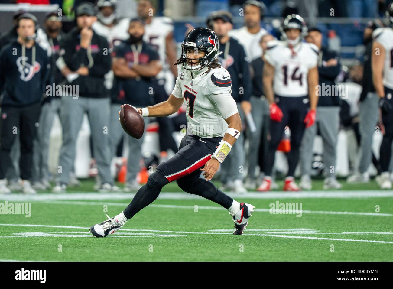 Houston Texans quarterback C.J. Stroud runs with the ball during an NFL ...