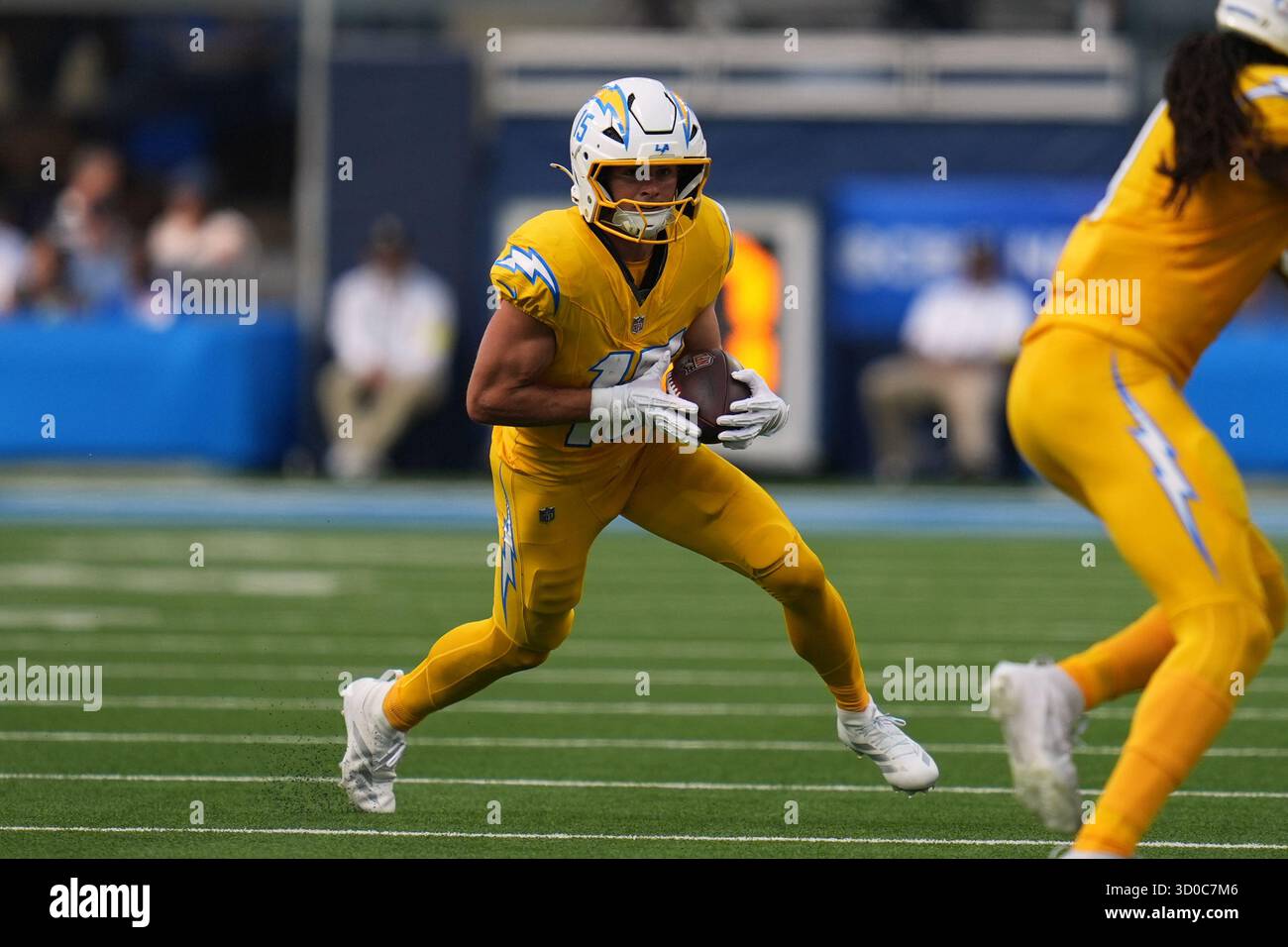 Los Angeles Chargers wide receiver Ladd McConkey runs with the ball ...