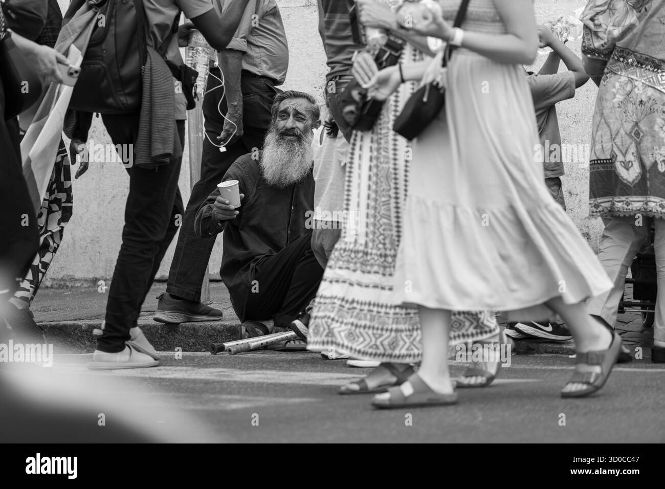Homeless person begging crowd hi-res stock photography and images - Alamy