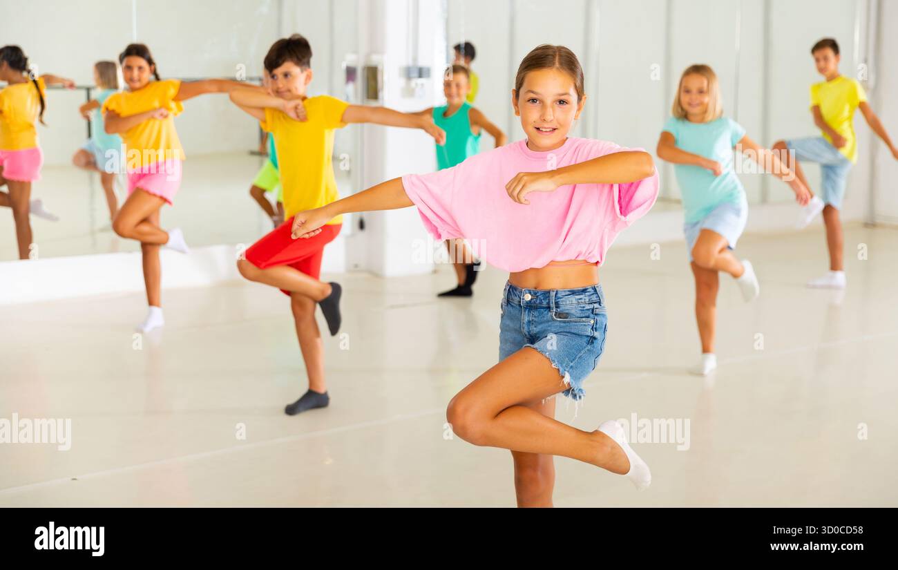 Dance studio - girls and boys in dance lesson Stock Photo - Alamy