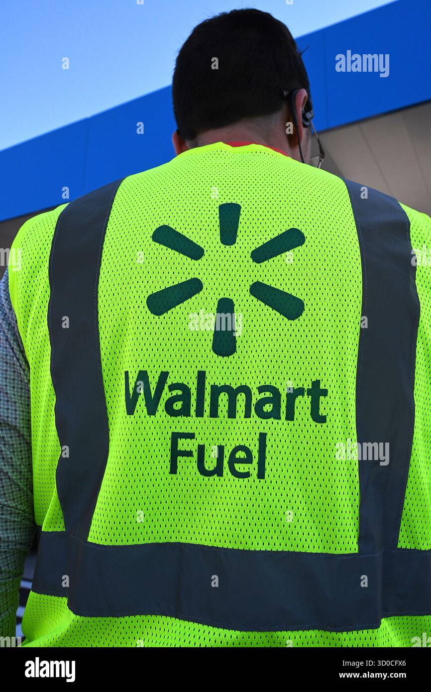 EMPORIA, KANSAS - OCTOBER 22, 2025 Walmart employee wearing branded ...