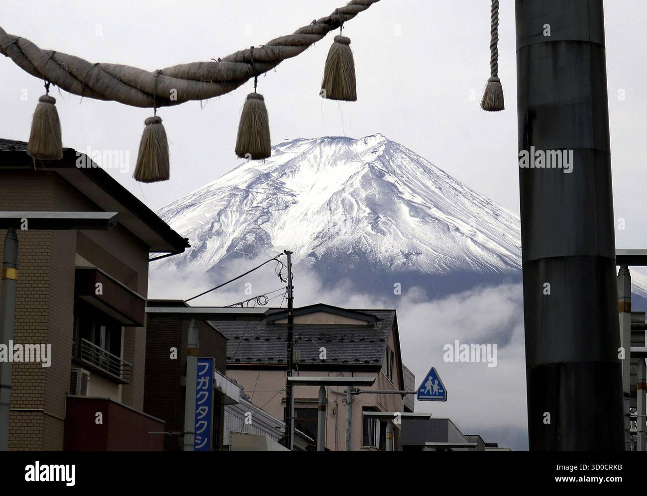 The first snowfall around the summit of Mount Fuji is observed from ...