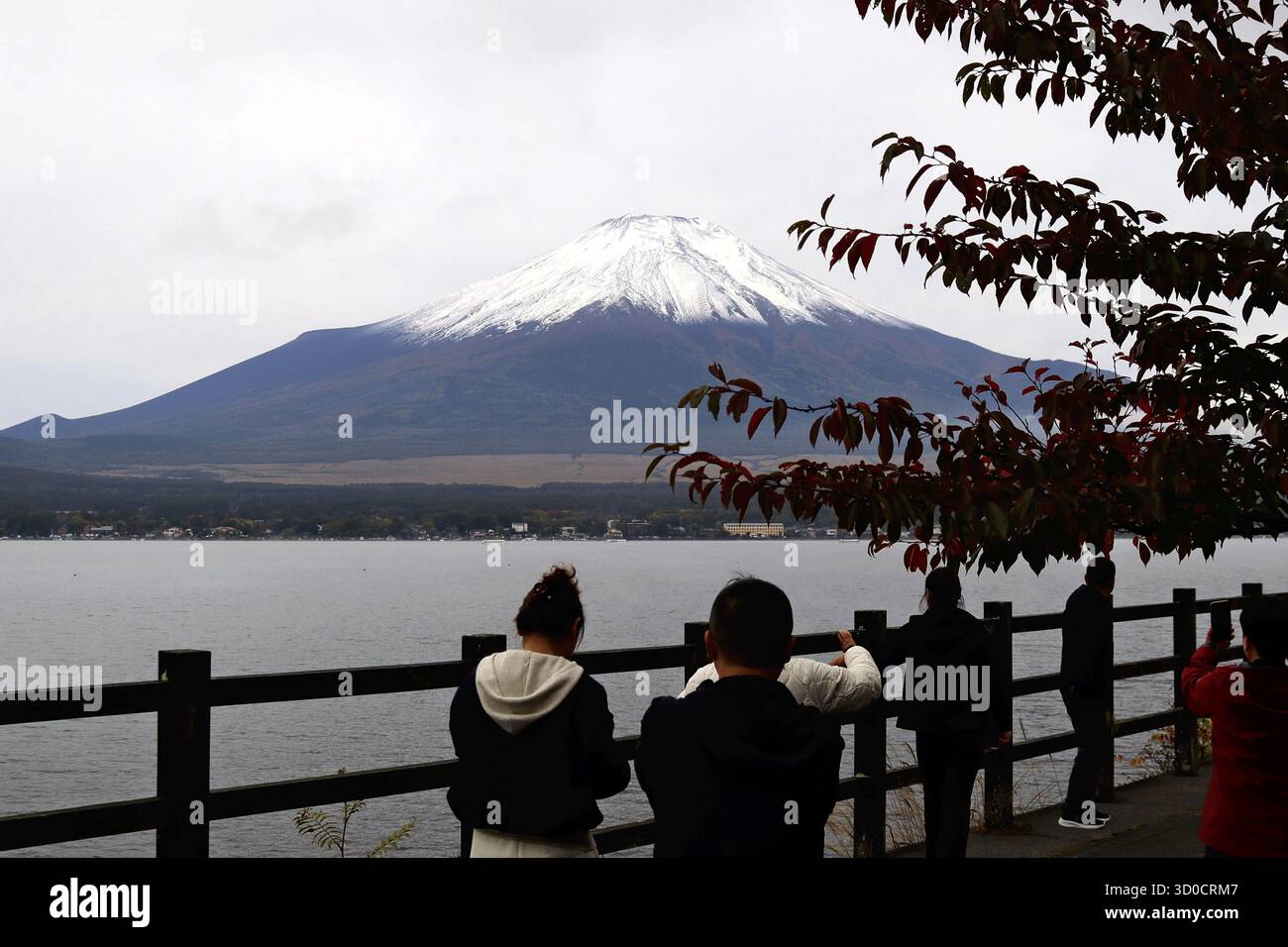 The first snowfall around the summit of Mount Fuji is observed from ...